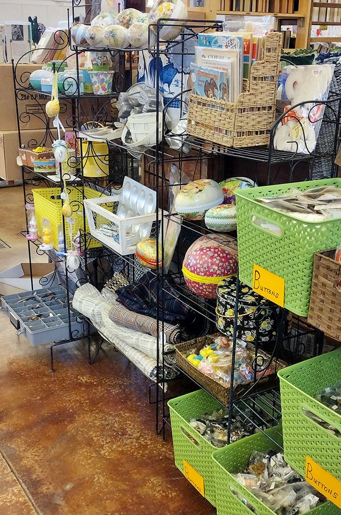 Craft supply wonderland! This metal tower of creative possibilities holds enough buttons, baskets and fabric to keep Pinterest boards busy until the next millennium.