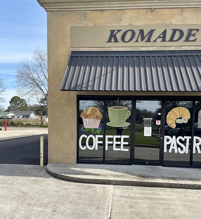 Simple storefront graphics that promise fresh pastries and perfectly brewed coffee await inside your visit.