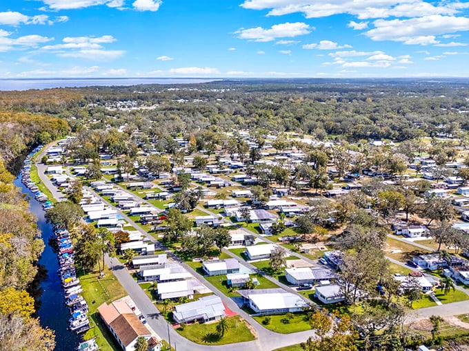 Aerial view of a community designed for affordable living. Waterfront access without waterfront taxes&mdash;now that's retirement math that works!