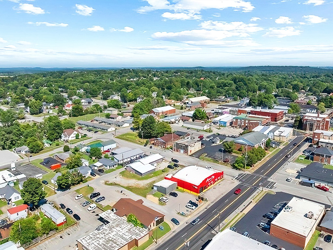 From up here, Leitchfield looks like someone scattered a perfect little town across Kentucky's green canvas. Affordable living with a view!