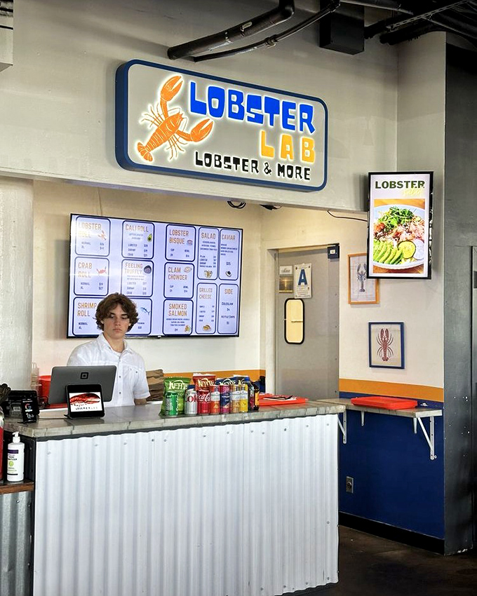The casual setup belies the serious lobster skills happening behind that simple counter in this bustling food hall.