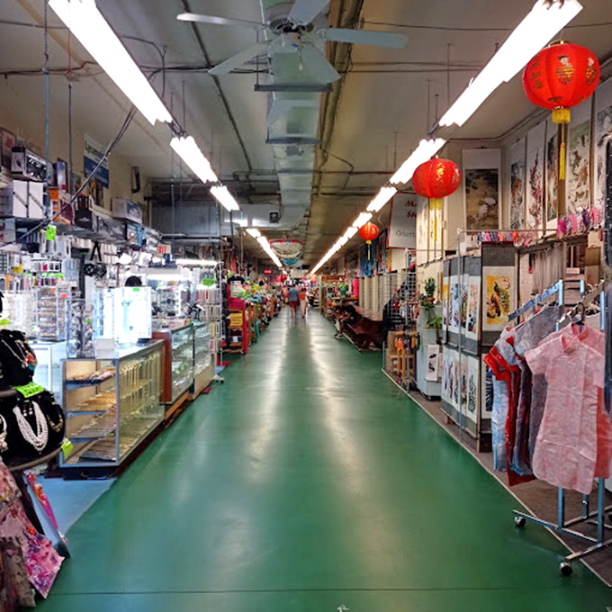 Fluorescent lights illuminate endless possibilities - every aisle holds potential treasures waiting for discovery.