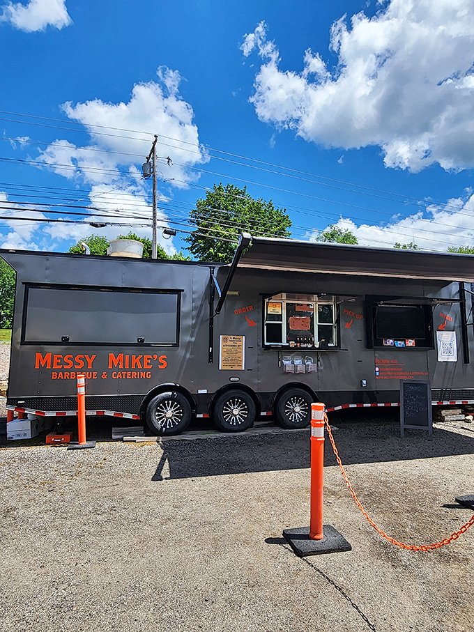 Messy Mike's sleek black trailer is like the BBQ equivalent of a stealth fighter - unexpected and packing serious firepower.
