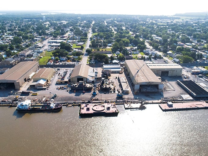 Industrial Louisiana meets natural beauty where working rivers flow toward the Gulf of Mexico.