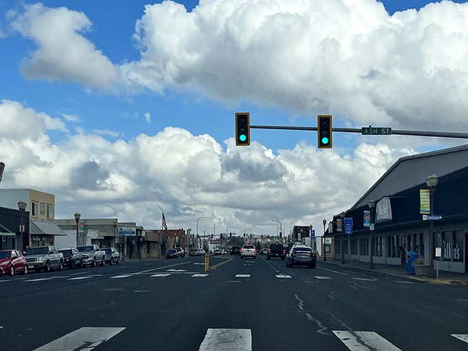Main Street stretches toward mountains like a postcard, reminding you why simple living feels so right.
