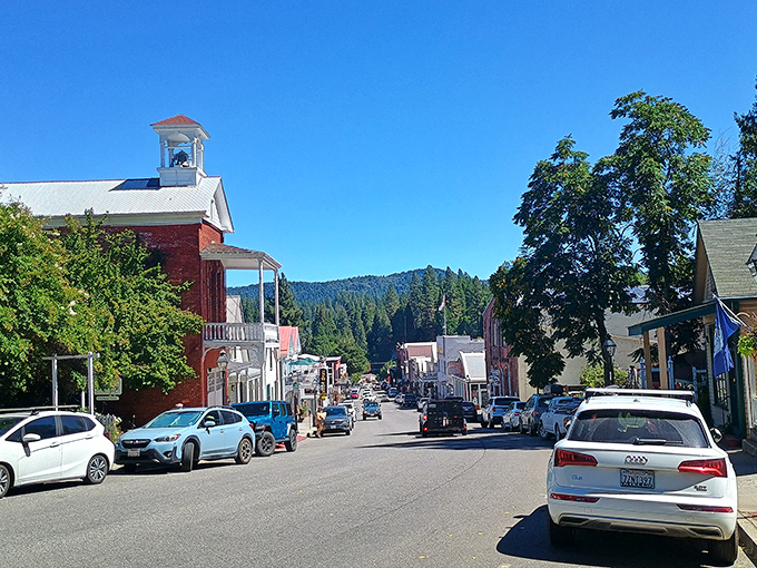 Nevada City's main street climbs gently uphill, rewarding explorers with Victorian splendor. The red brick courthouse watches over everything like a proud parent.