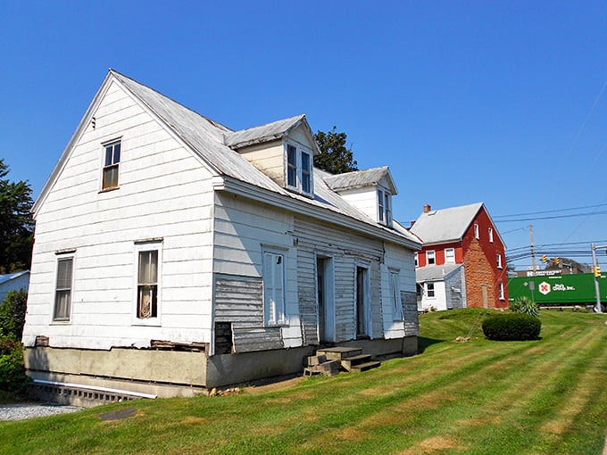 Simple white houses dot New Holland's countryside, their clean lines and practical design reflecting the Amish values of simplicity and function.