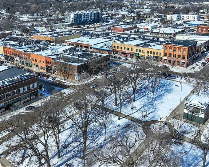 Aerial view reveals the perfect balance of residential comfort and natural beauty that defines quality living.