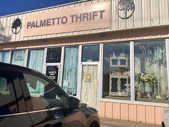 Window displays at Palmetto Thrift showcase vintage curtains and home d&eacute;cor. Peek through the glass at bargains waiting to be discovered.