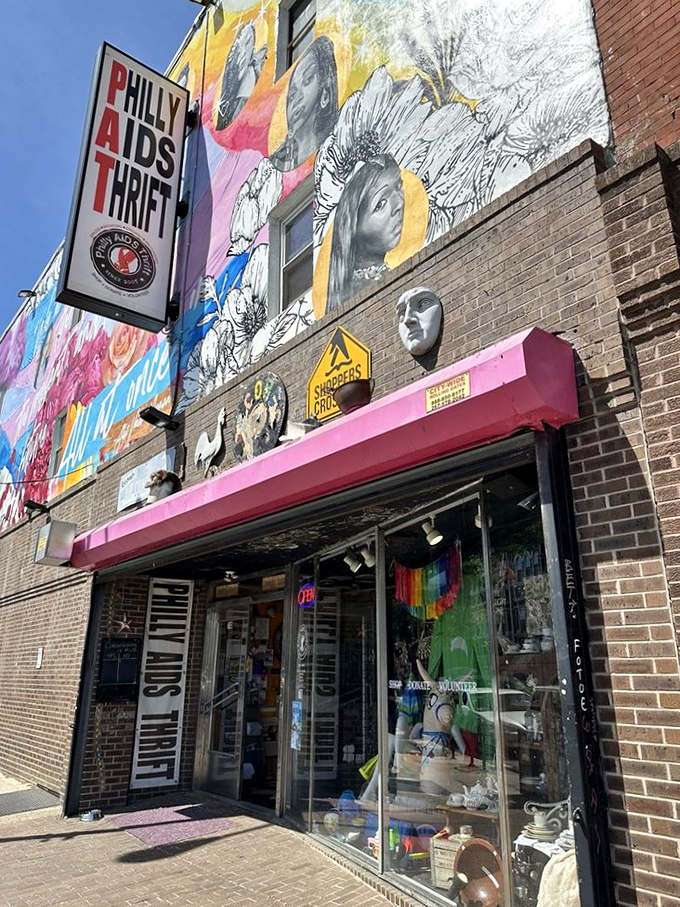 The colorful street art transforms this thrift shop into a cultural landmark that serves the community.