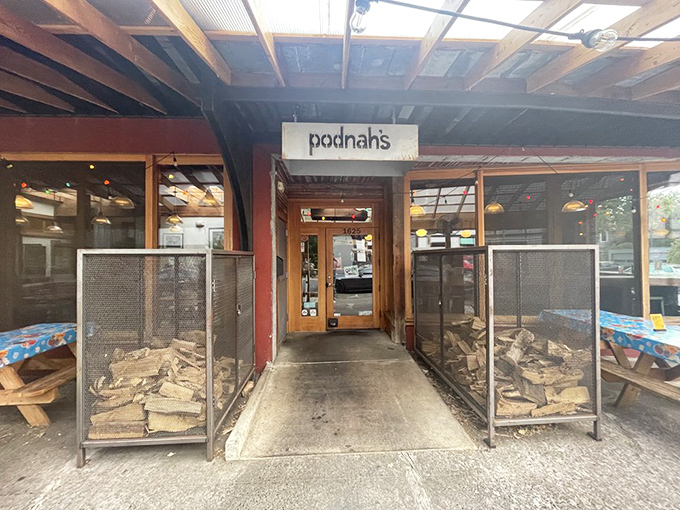 Podnah's understated entrance hides BBQ greatness within. Those stacks of firewood outside tell the real story of what's happening inside.