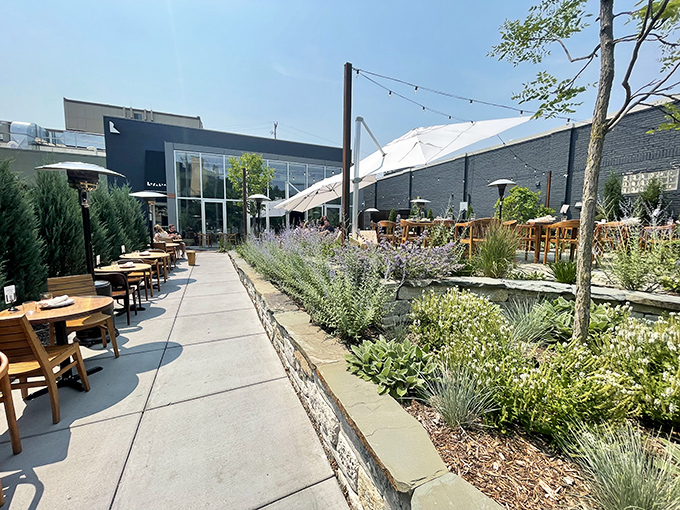 The gorgeous patio garden setting makes you wonder if plants grow better when regularly exposed to the aroma of perfect wood-fired pizza.