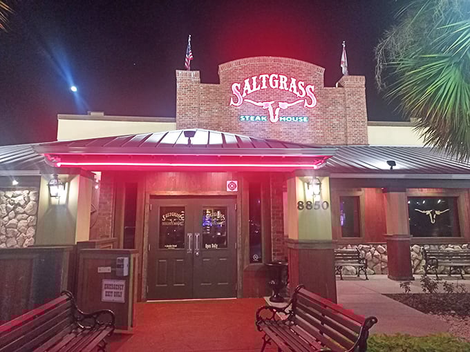 Those glowing windows promise the kind of warm hospitality that makes every meal feel like a celebration.