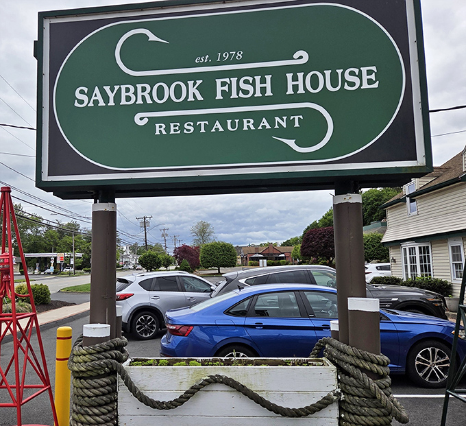 This bold green sign points the way to Saybrook Fish House, proving you don&rsquo;t need to be on the shoreline to reel in great seafood.