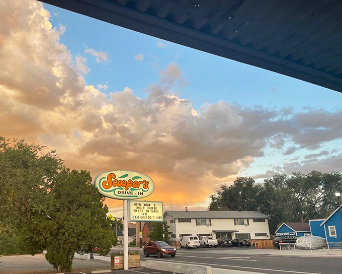 When that vintage neon glows against golden hour clouds, you know magic's about to happen.