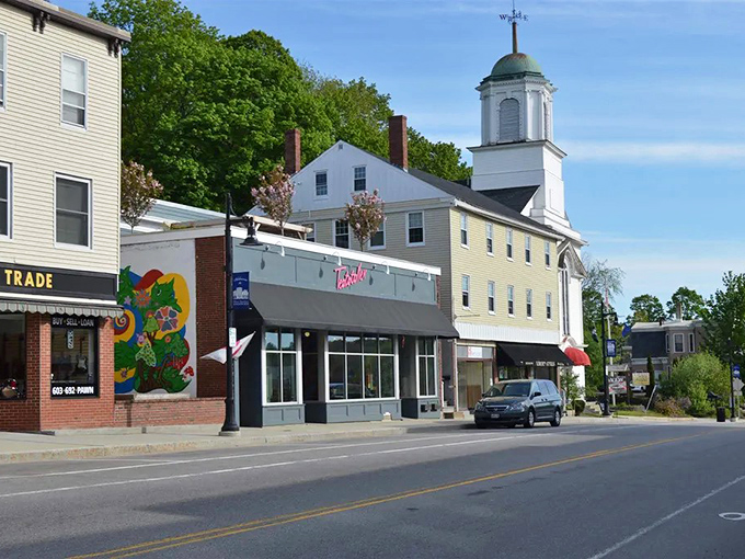 This inviting main street stretches out like a red carpet, welcoming residents to discover affordable living at its finest.