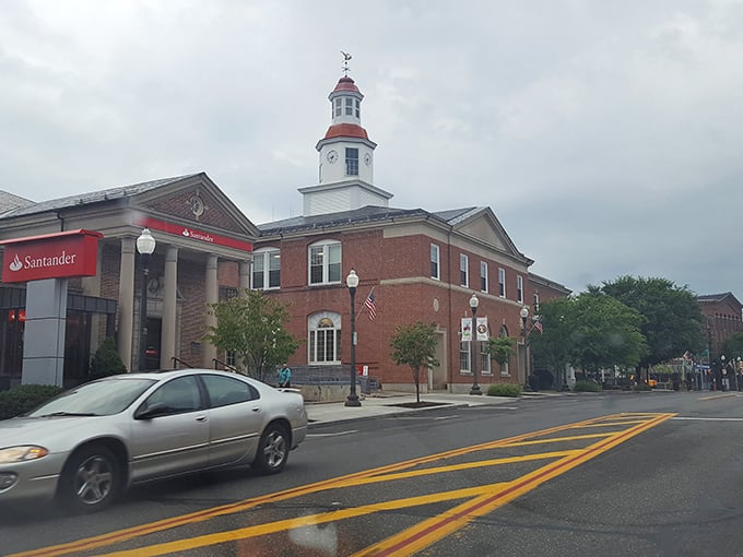 Historic brick buildings in Southbridge house modern businesses serving budget-conscious community members daily.