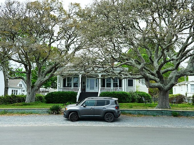 Southport's historic homes with sprawling oak trees create the perfect setting for a small-town romance movie scene.