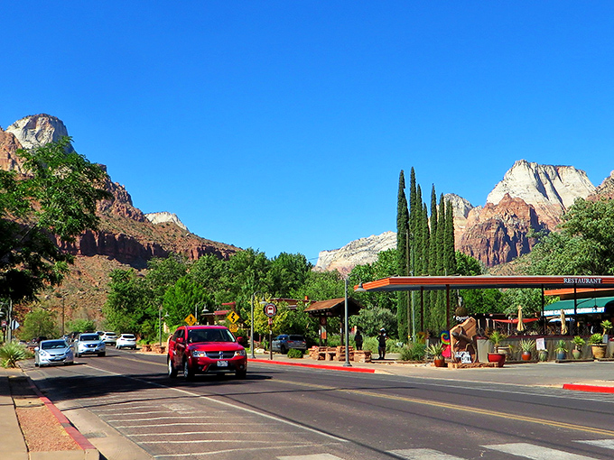 Red and white rock formations dwarf the town below, reminding everyone that Springdale exists in nature's most dramatic neighborhood.
