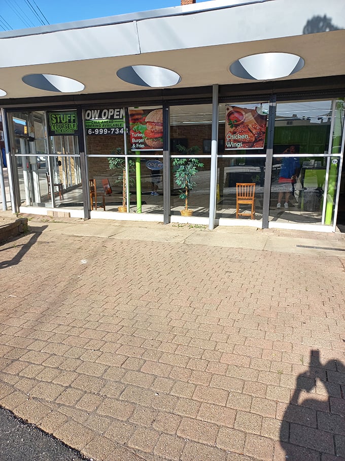 Stuff Yourself's modern storefront offers a temple of temptation. Those chairs outside? You'll need them for the food coma after!