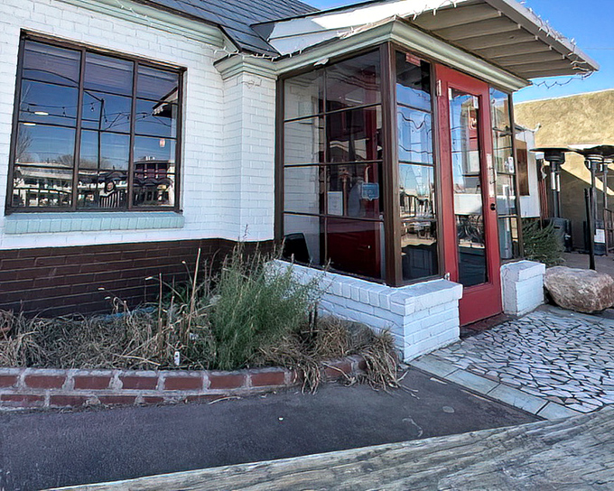 That red door is the gateway to comfort food heaven, where farm-fresh ingredients get the respect they deserve.