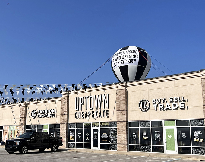 The sleek storefront with its eye-catching balloon display promises that secondhand shopping here will be anything but ordinary.