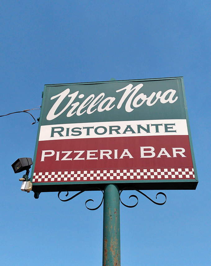 That classic tricolor sign is the Italian equivalent of "good food this way"&mdash;and it never disappoints.