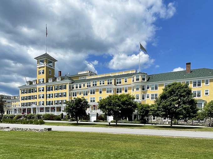 Sunshine yellow grandeur! Whitefield's mountain resort stands like a magnificent wedding cake against nature's perfect blue-sky backdrop.