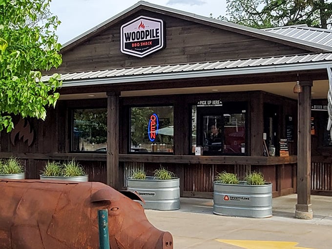 The repurposed water tanks outside Woodpile BBQ Shack hint at the resourceful creativity that makes this Clawson spot special.