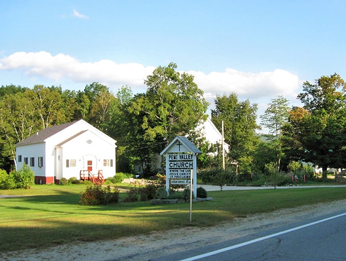Main Street Woodstock &ndash; where small-town New Hampshire shows its white church nestled on the side that seem plucked from a more peaceful era.