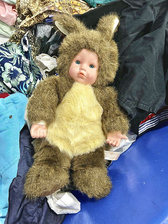 "I was a bear in my former life." This Anne Geddes-style baby doll waits for either a loving home or the next Halloween costume party.