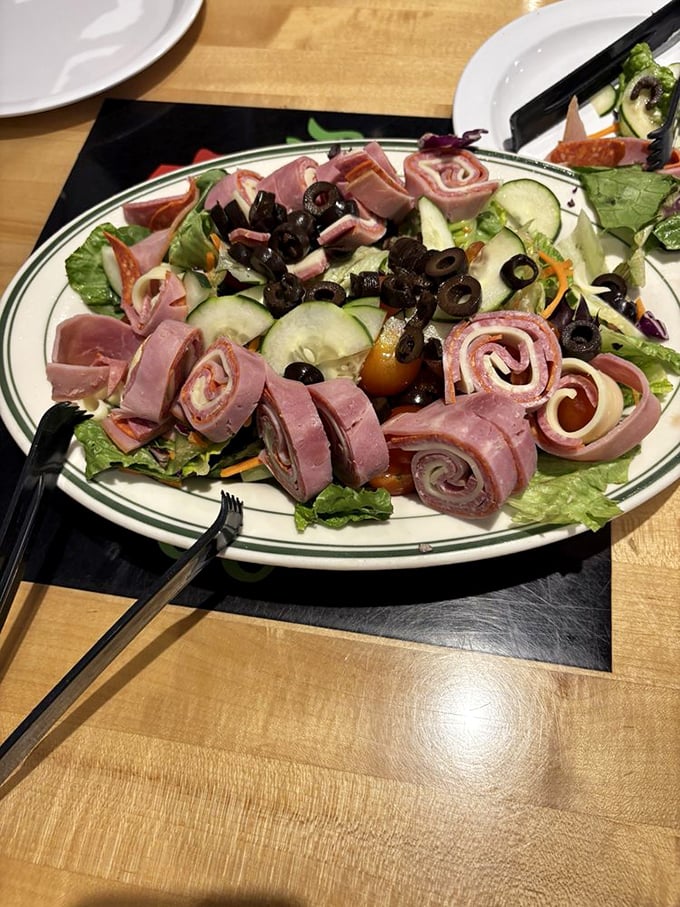 An antipasto salad that proves vegetables can party too. Those ham roll-ups are dressed and ready for their night on the town.