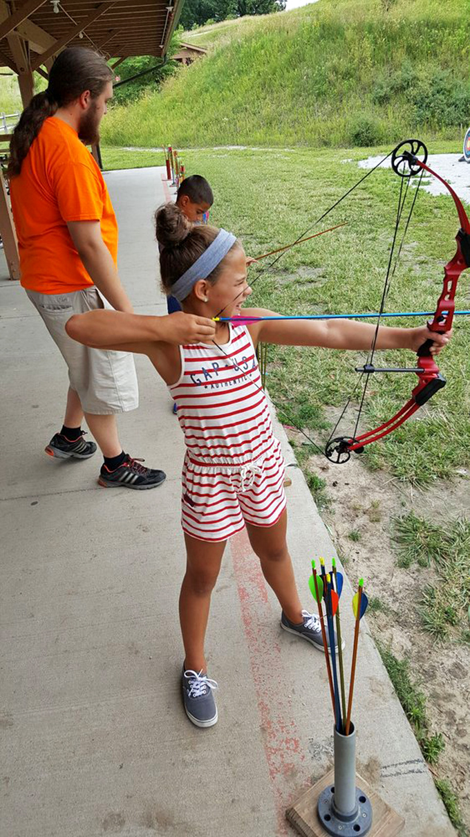 Future Olympians take aim at the park's archery range, where bullseyes are celebrated and near-misses become "learning opportunities."