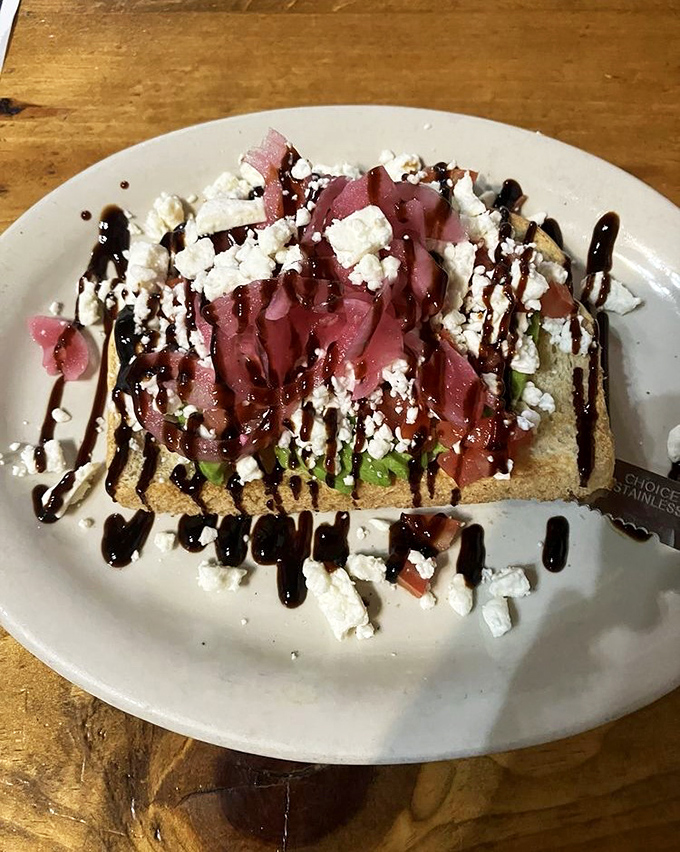 Avocado toast that would make millennials weep with joy. The balsamic drizzle and feta crumbles elevate this from trendy to transcendent.