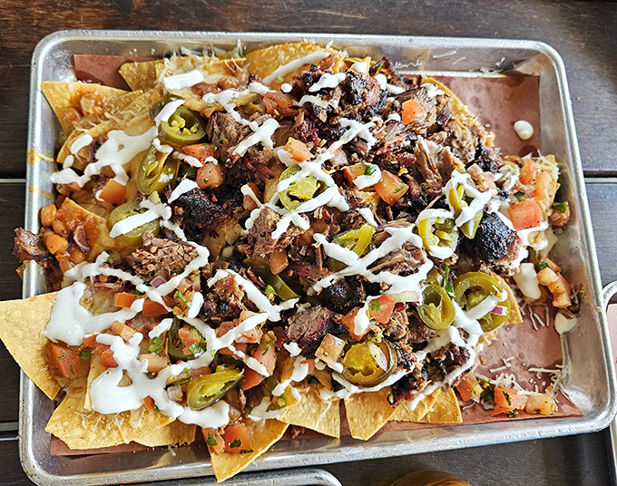 BBQ nachos that laugh in the face of restraint&mdash;a mountain of chips, cheese, jalape&ntilde;os and chopped brisket that demands to be shared but deserves to be hoarded.