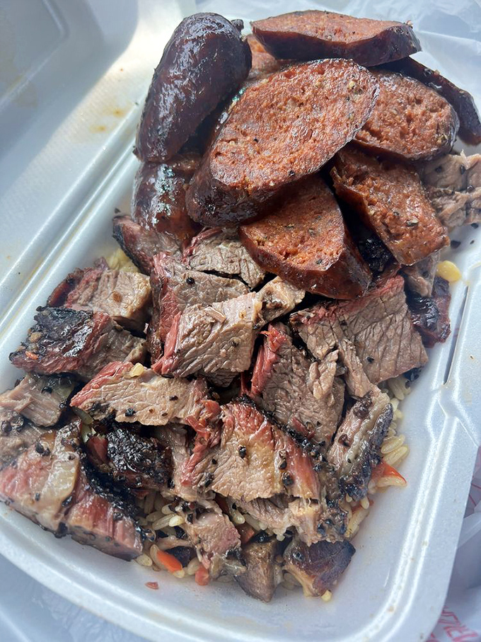 A BBQ bowl that's basically meat Tetris&mdash;perfectly arranged brisket, sausage, and sides creating a game where everybody wins, especially your taste buds.