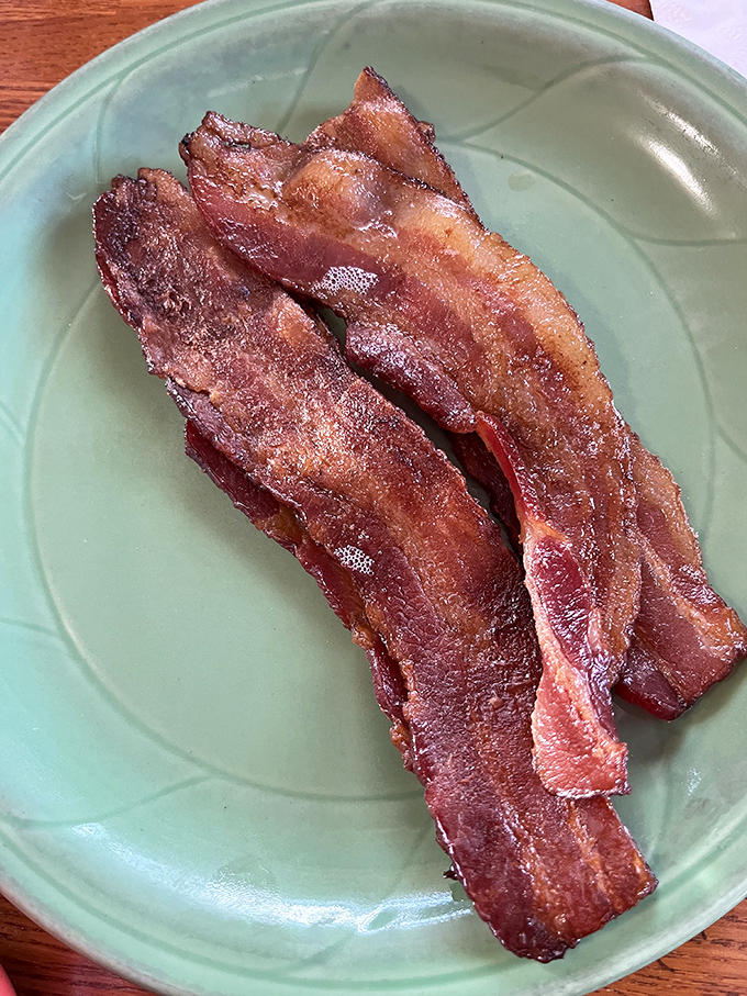 Bacon that's achieved that mythical balance between crisp and chewy—the breakfast equivalent of finding a unicorn in your backyard.