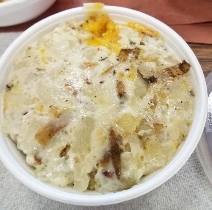 The potato casserole looks like it was sent directly from a church potluck, blessed by the barbecue gods themselves.