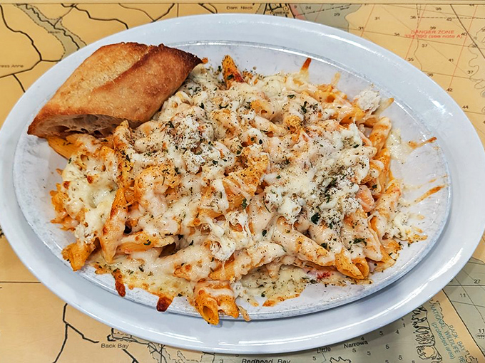Cheesy baked seafood pasta that would make an Italian grandmother nod in approval. Served on a nautical chart because this dish will navigate straight to your heart. 