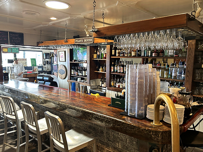 A bar that tells stories without saying a word &ndash; those hanging glasses have witnessed more coastal celebrations than a lighthouse keeper. 