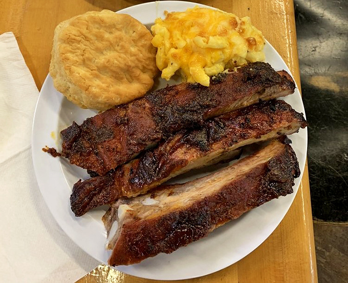 These ribs don't just fall off the bone&mdash;they practically leap onto your fork, bringing mac and cheese and a perfect biscuit along for the ride.