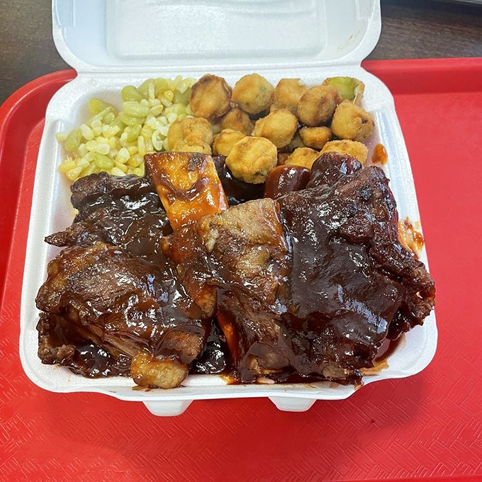 Barbecue ribs glistening with sauce that should be bottled and sold as cologne. The meat doesn't fall off the bone&mdash;it leaps willingly onto your fork.