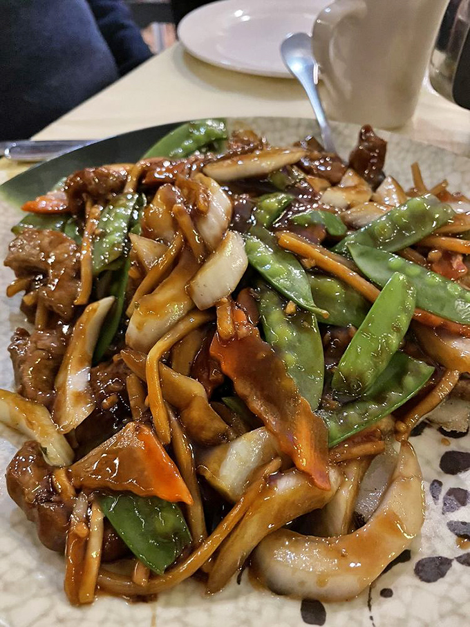 Beef chow fun with vegetables so fresh and sauce so glossy, you can practically see your reflection in it. Noodle nirvana achieved.