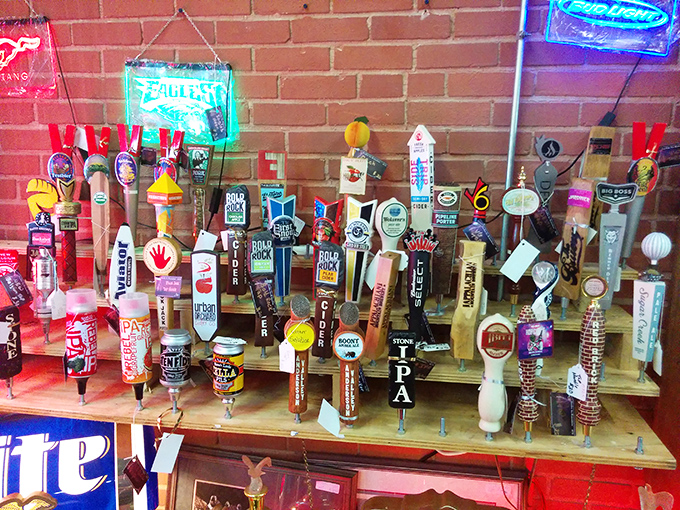 Beer tap handles standing at attention like tiny soldiers from happy hour battles past. The Eagles one is practically singing "Take It Easy."