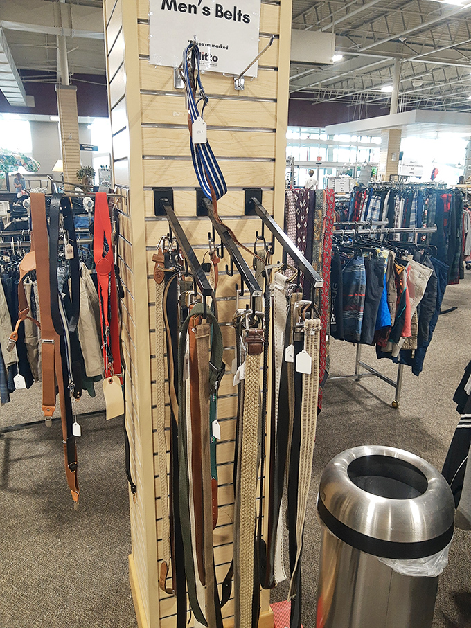 The belt display&mdash;where leather strips hang like trophies, waiting to perform the heroic duty of keeping pants where they belong.