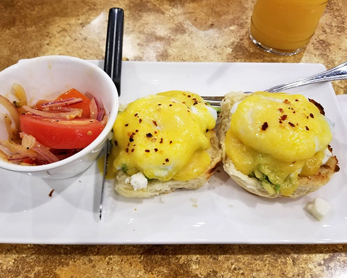 Eggs Benedict gets a makeover that would make any brunch aficionado weak at the knees. That hollandaise sauce is practically glowing with potential.