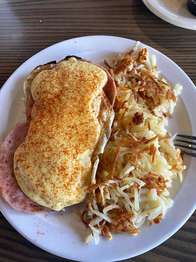 Eggs Benedict dressed up like it's going to the opera, but friendly enough to hang with the hash browns.