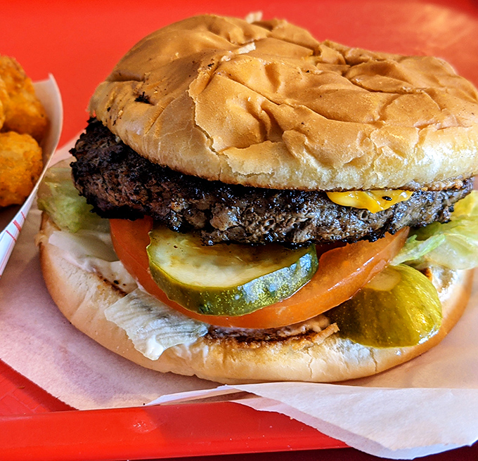 The Big Joe Burger stands tall and proud, a monument to everything right about American roadside dining.