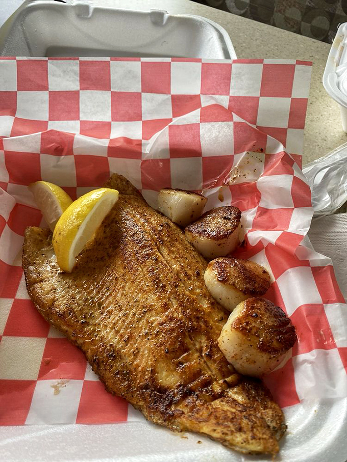 Blackened fish with perfectly seared scallops&mdash;proof that sometimes the simplest preparation lets quality ingredients shine. That caramelization is what dreams are made of.