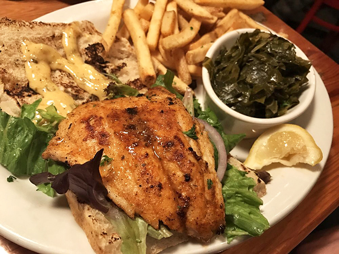 A sandwich that requires both hands and several napkins. This blackened fish creation makes fast food burgers weep with inadequacy.